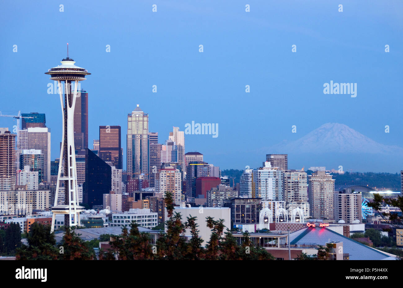 Seattle skyline with the Space Needle, and Mount Rainier on the horizon ...