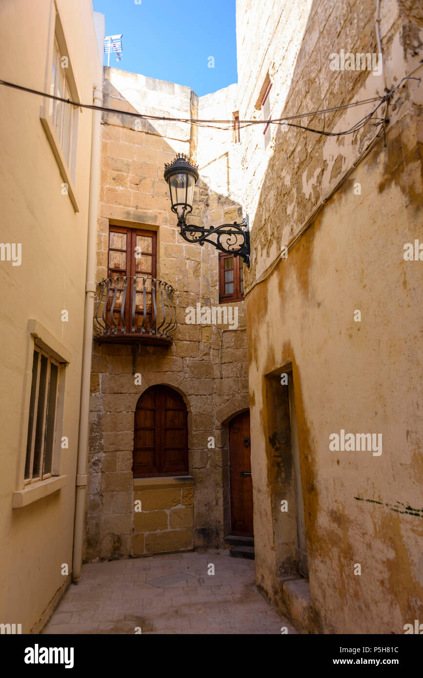 A small, traditional house in the narrow alleyways of Victoria Old Town ...