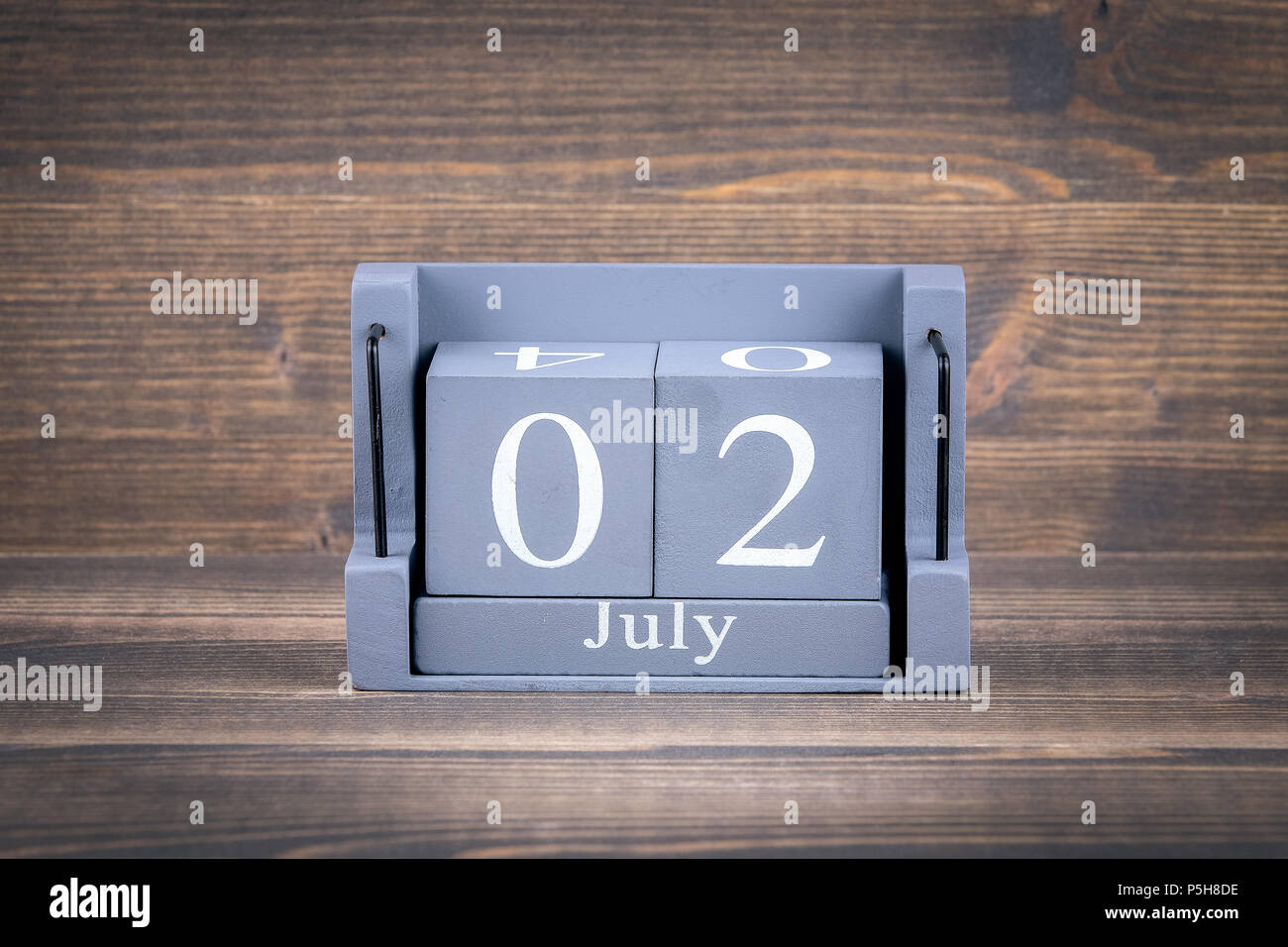 2 july wooden, square calendar Stock Photo - Alamy