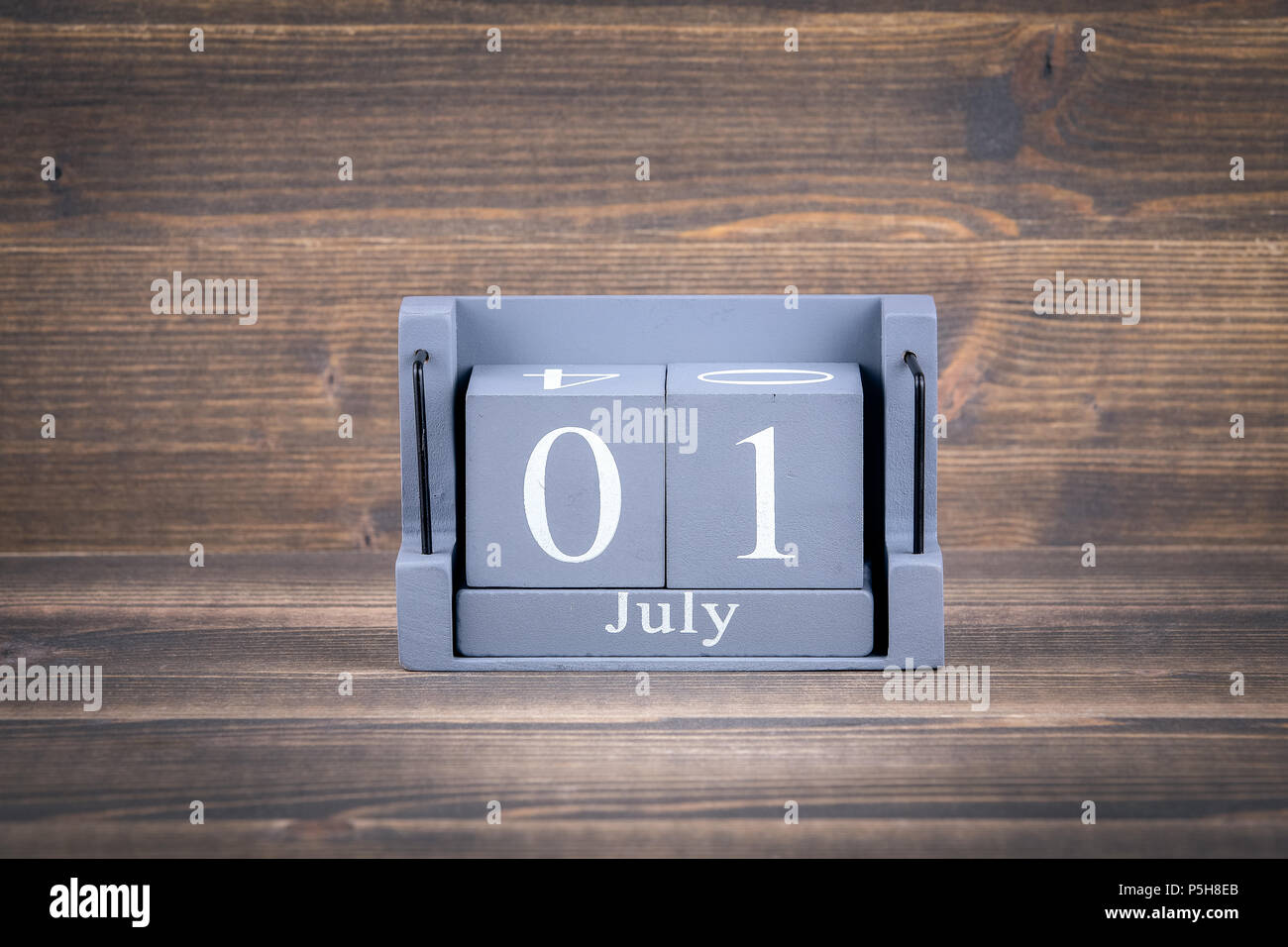 1 july wooden, square calendar Stock Photo - Alamy