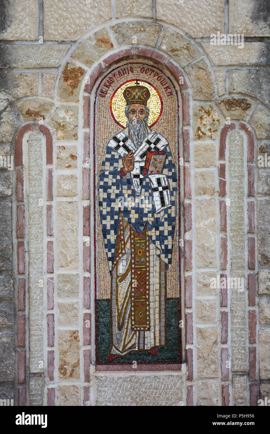Mosaic artwork of Saint Basil of Ostrog religious figure on gate post ...