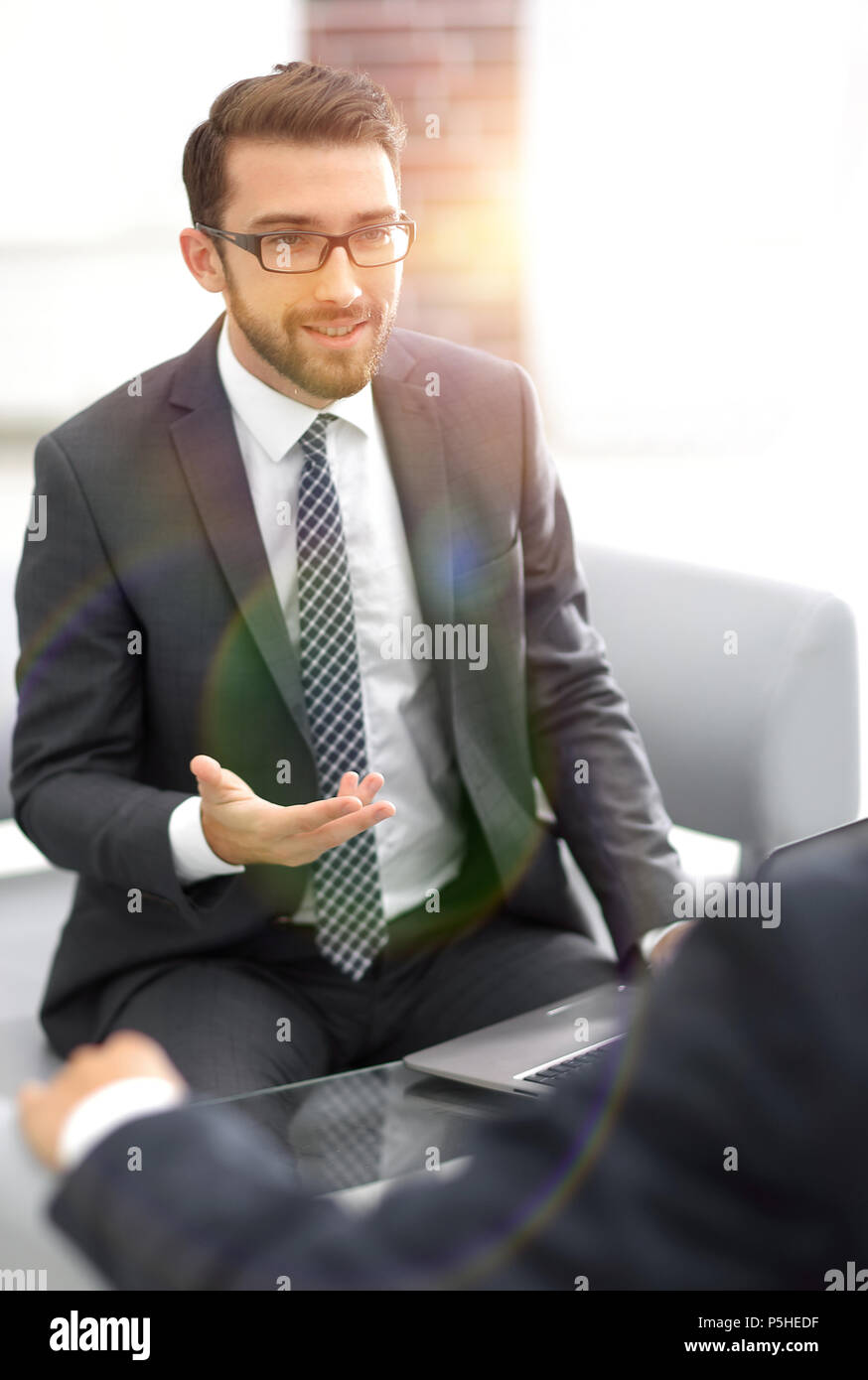 Portrait of a group of business men working together at a meetin Stock ...