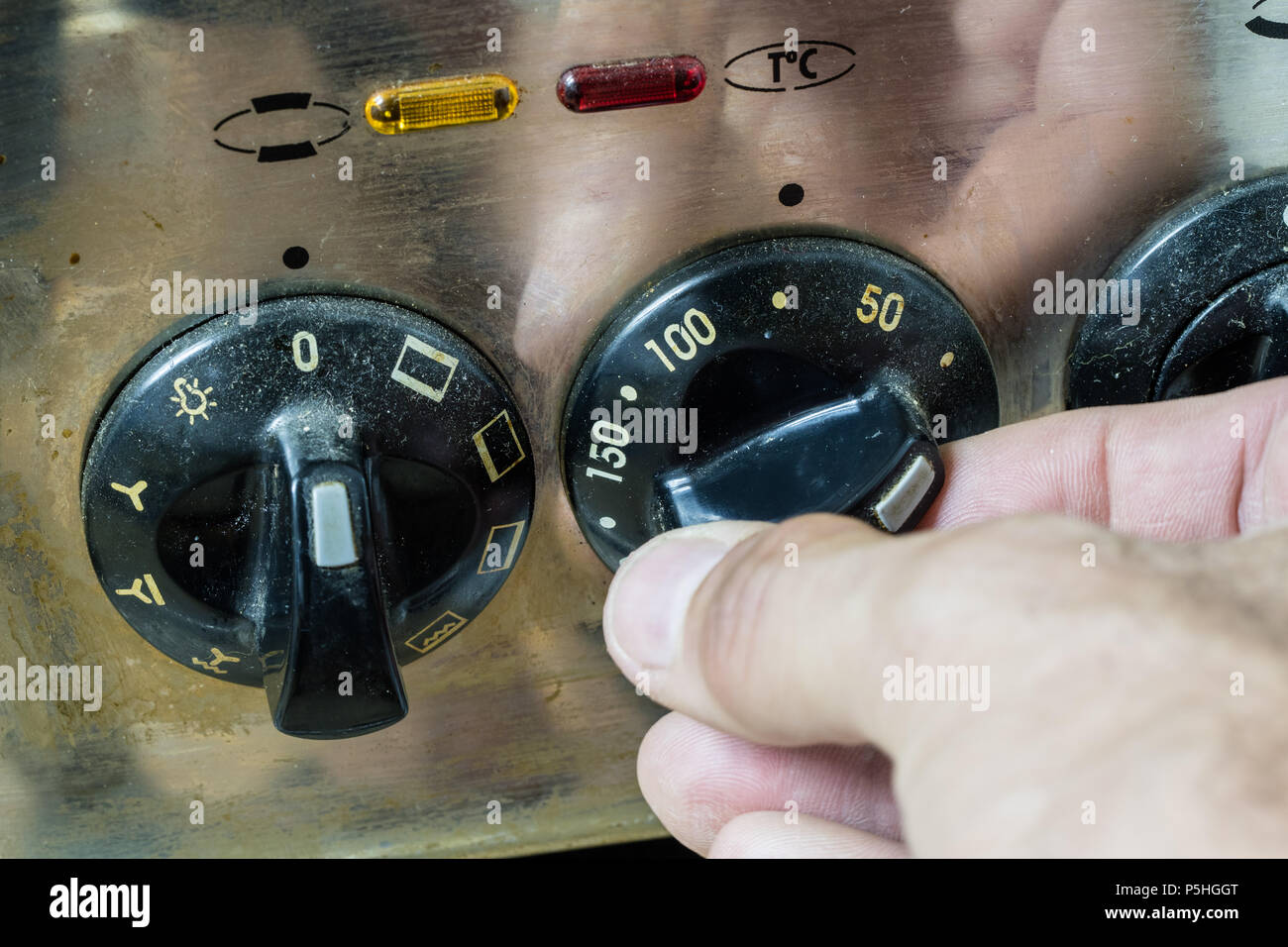 An old dirty gas kitchen. Device for preparing dishes in the kitchen ...