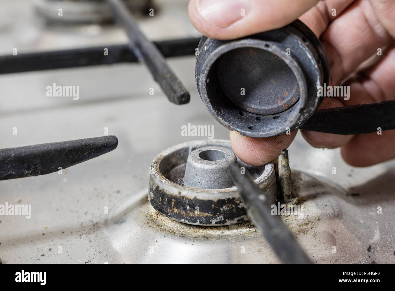 An old dirty gas kitchen. Device for preparing dishes in the kitchen ...