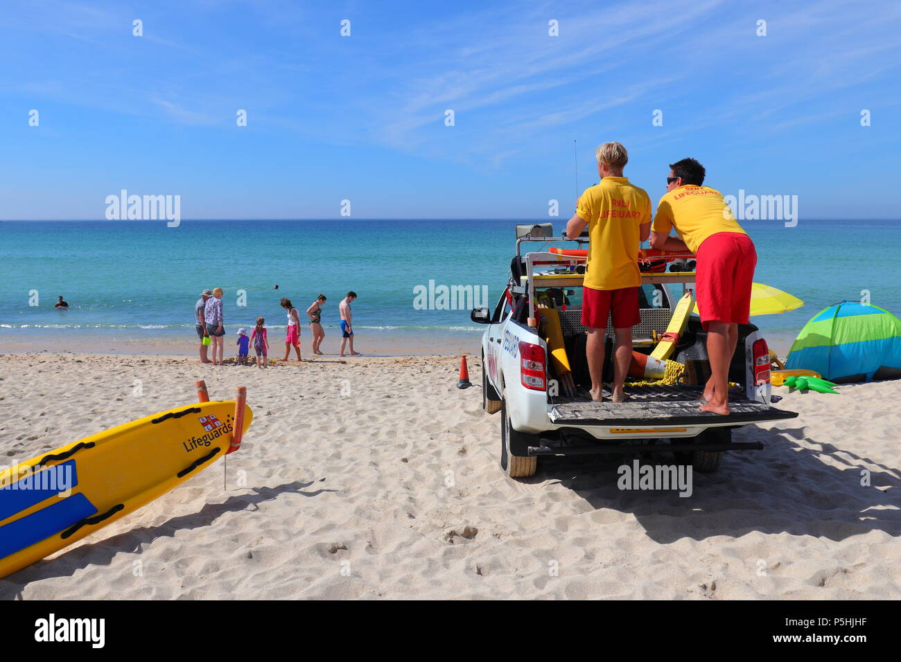RNLI Lifeguards On Porthmeor Beach, St Ives - Cornwall Stock Photo - Alamy