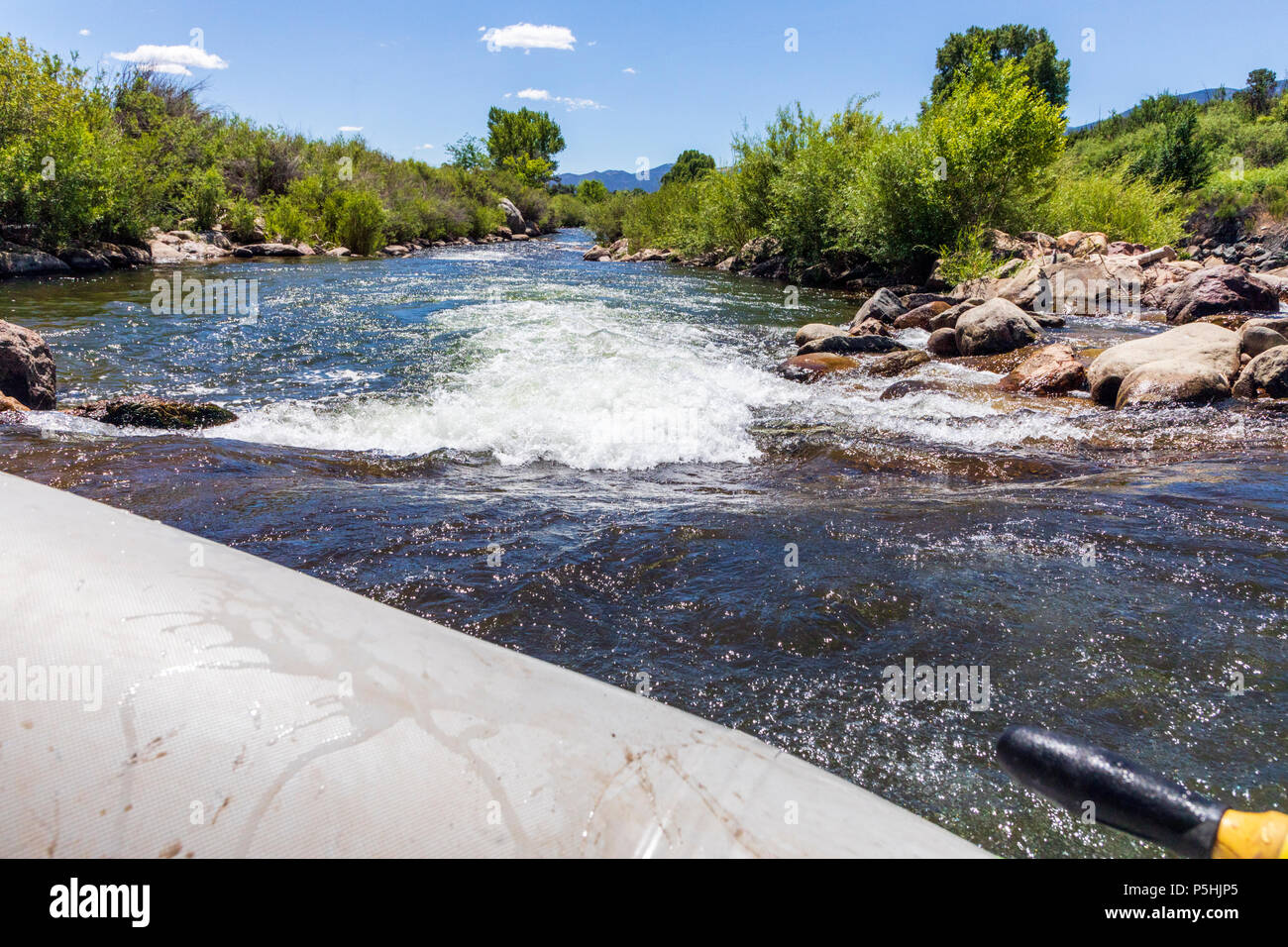 Rafting the Arkansas RIver, which runs runs through the downtown ...