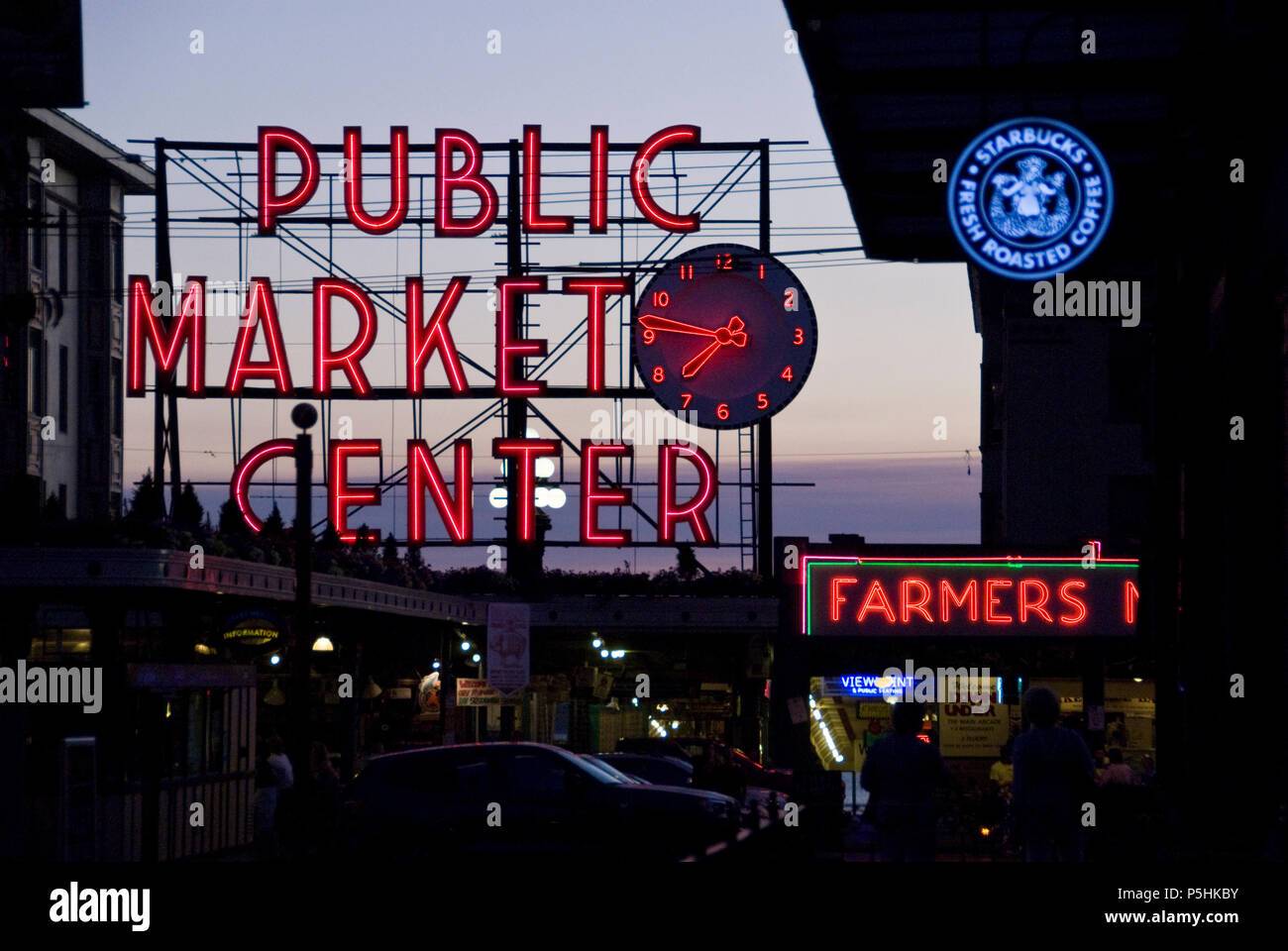 Neon "Public Market" sign at Pike Place Market at sunset, Seattle ...