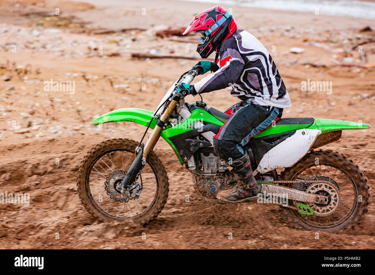 Professional Motocross Motorcycle Rider Drives Over the Road Track ...