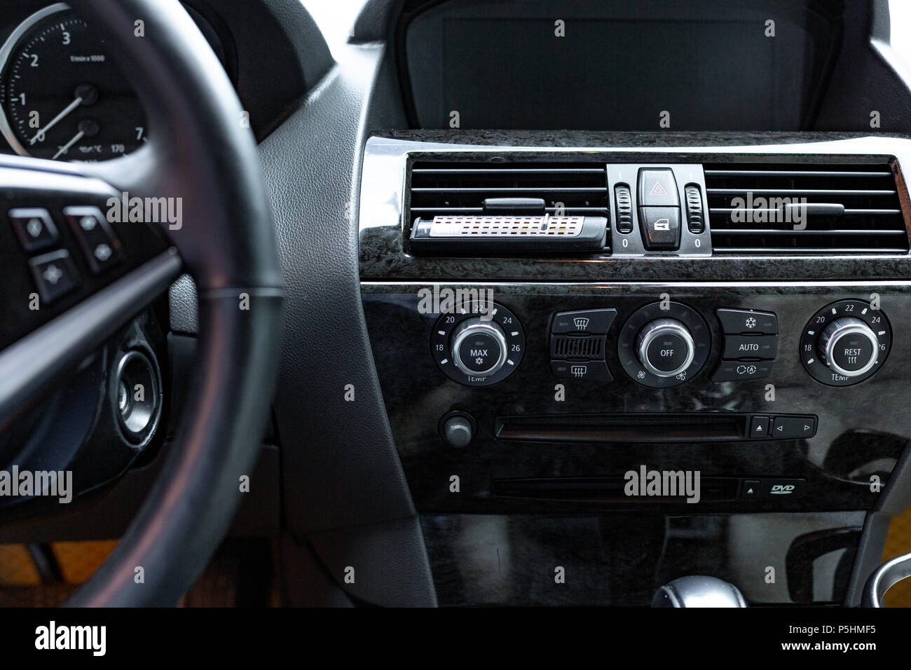 car interior. Modern car speedometer and dashboard. Luxurious car ...