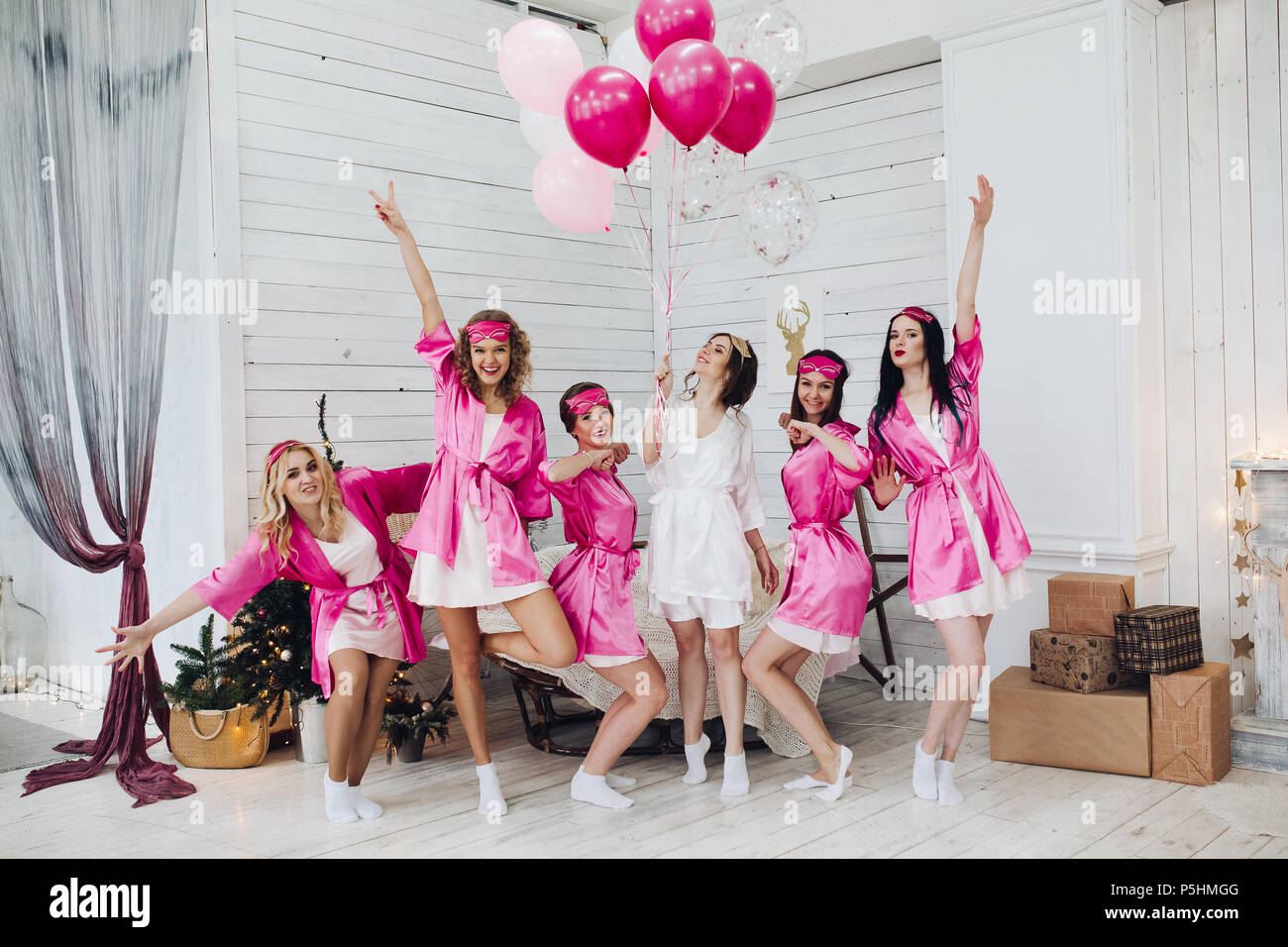 Bridesmaids and bride having fun at bachelorette party Stock Photo - Alamy