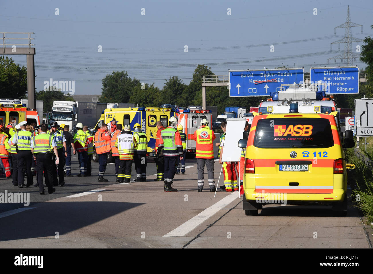 Ettlingen, Germany. 27th June, 2018. Emergency personnel standing on ...