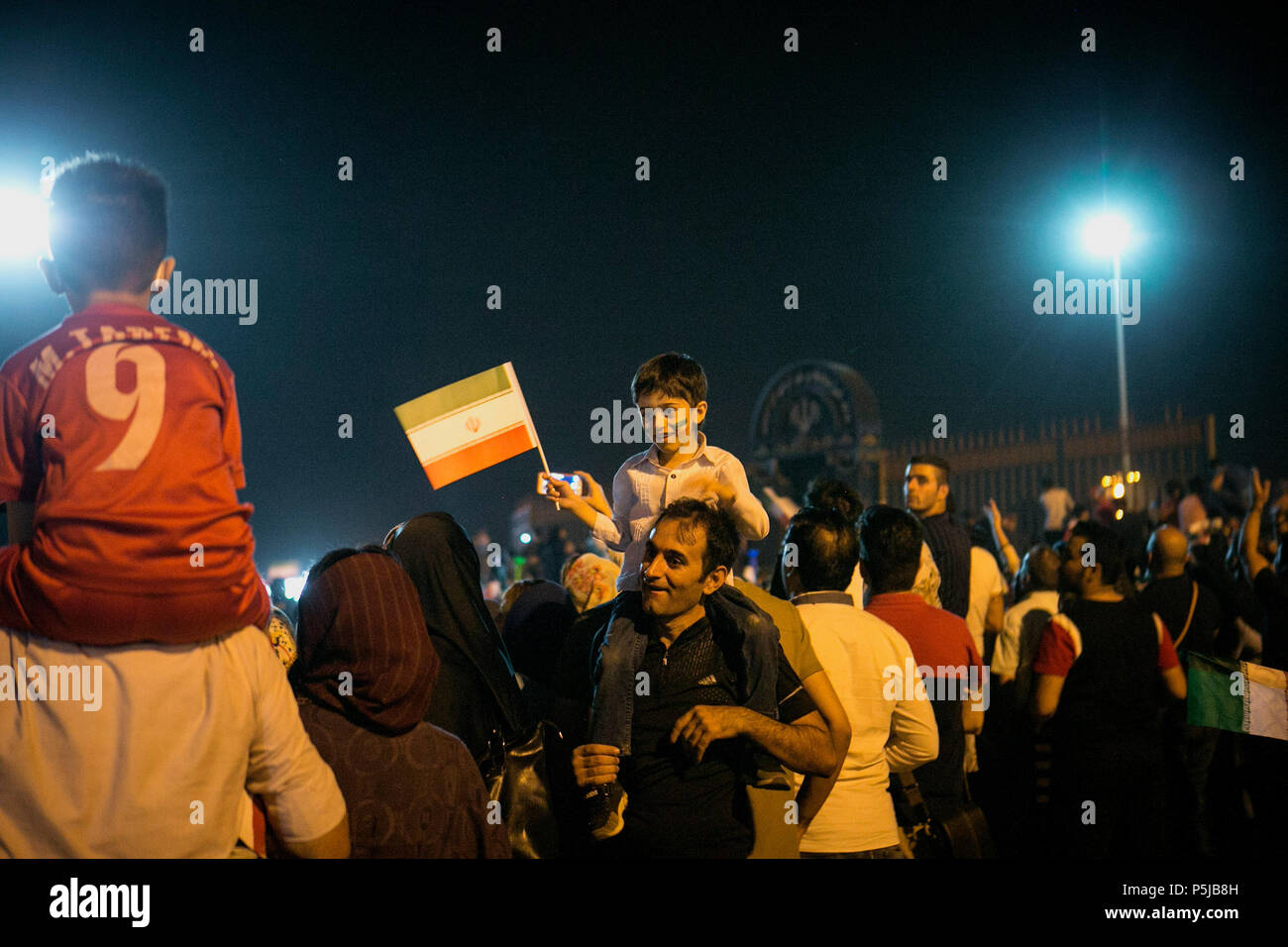 Tehran, Iran. 27th June, 2018. Iranian fans wait for the members of ...
