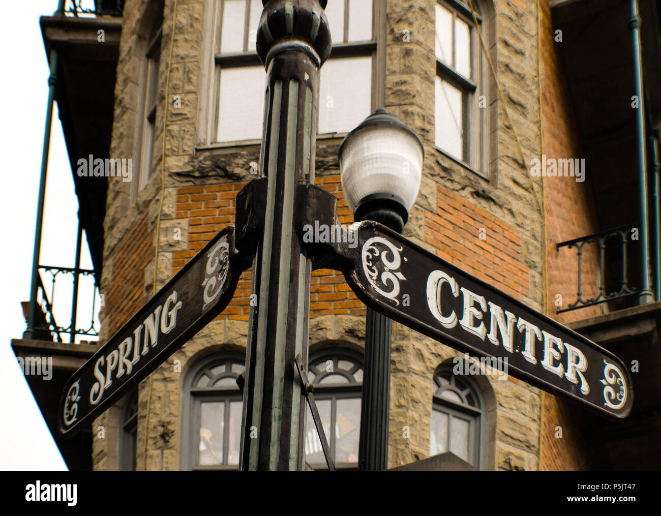 Street signs designating both Spring and Center streets in downtown ...