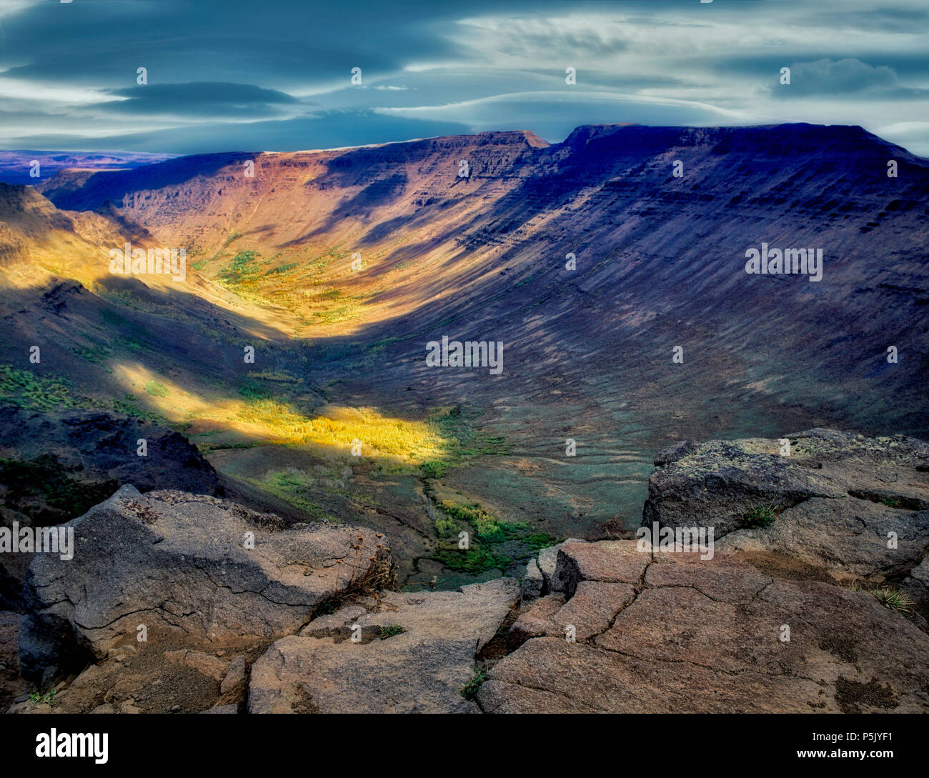 Kiger Gorge with aspen trees in fall color and shadow/sun patterns ...