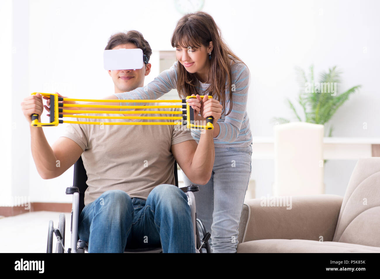 Disabled man with virtual glasses Stock Photo - Alamy