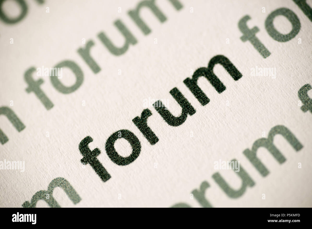 word forum printed on white paper macro Stock Photo - Alamy