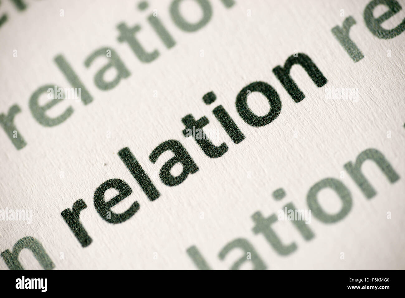 word relation printed on white paper macro Stock Photo - Alamy