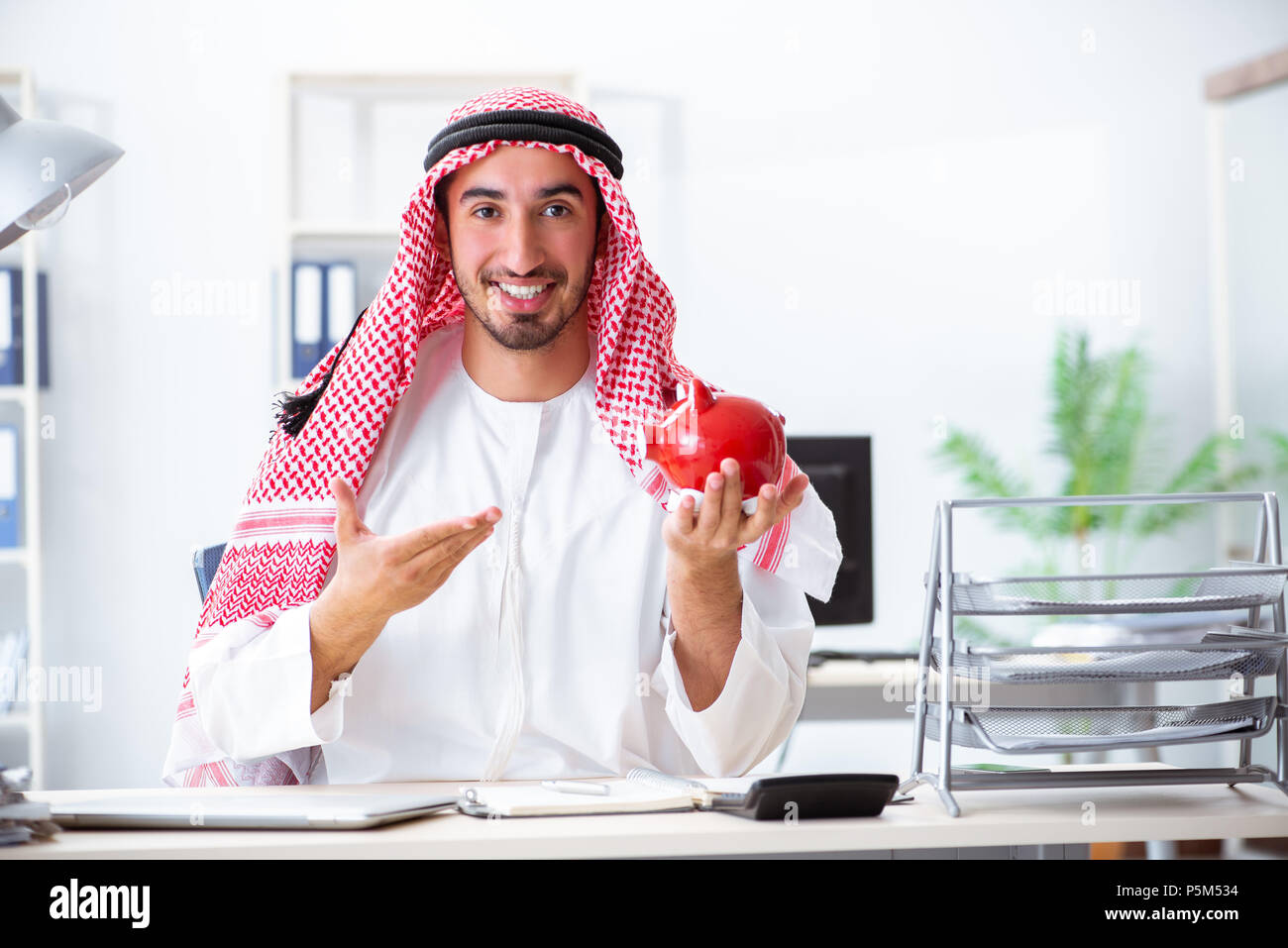 Arab businessman working in the office Stock Photo - Alamy