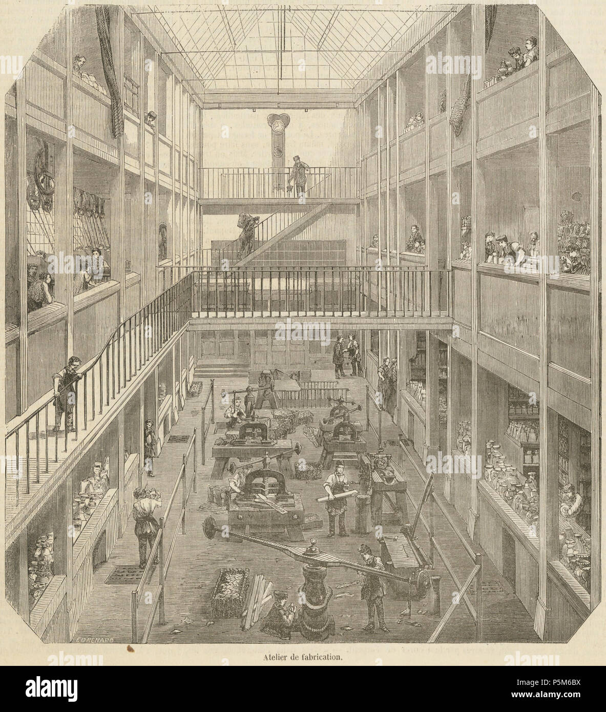 Atelier de fabrication . This image portrays a Parisian lamp factory in ...