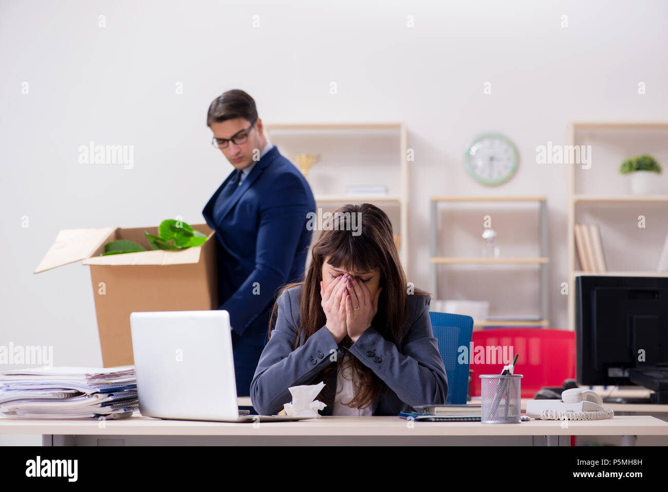 Person being fired from his work Stock Photo - Alamy