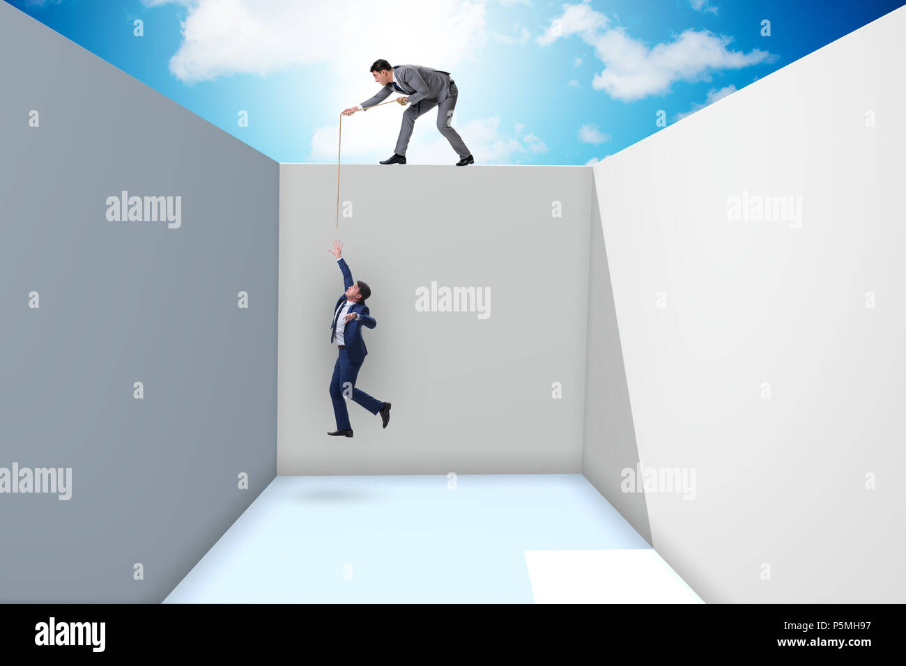 Businessman helping colleague to escape from problems Stock Photo - Alamy