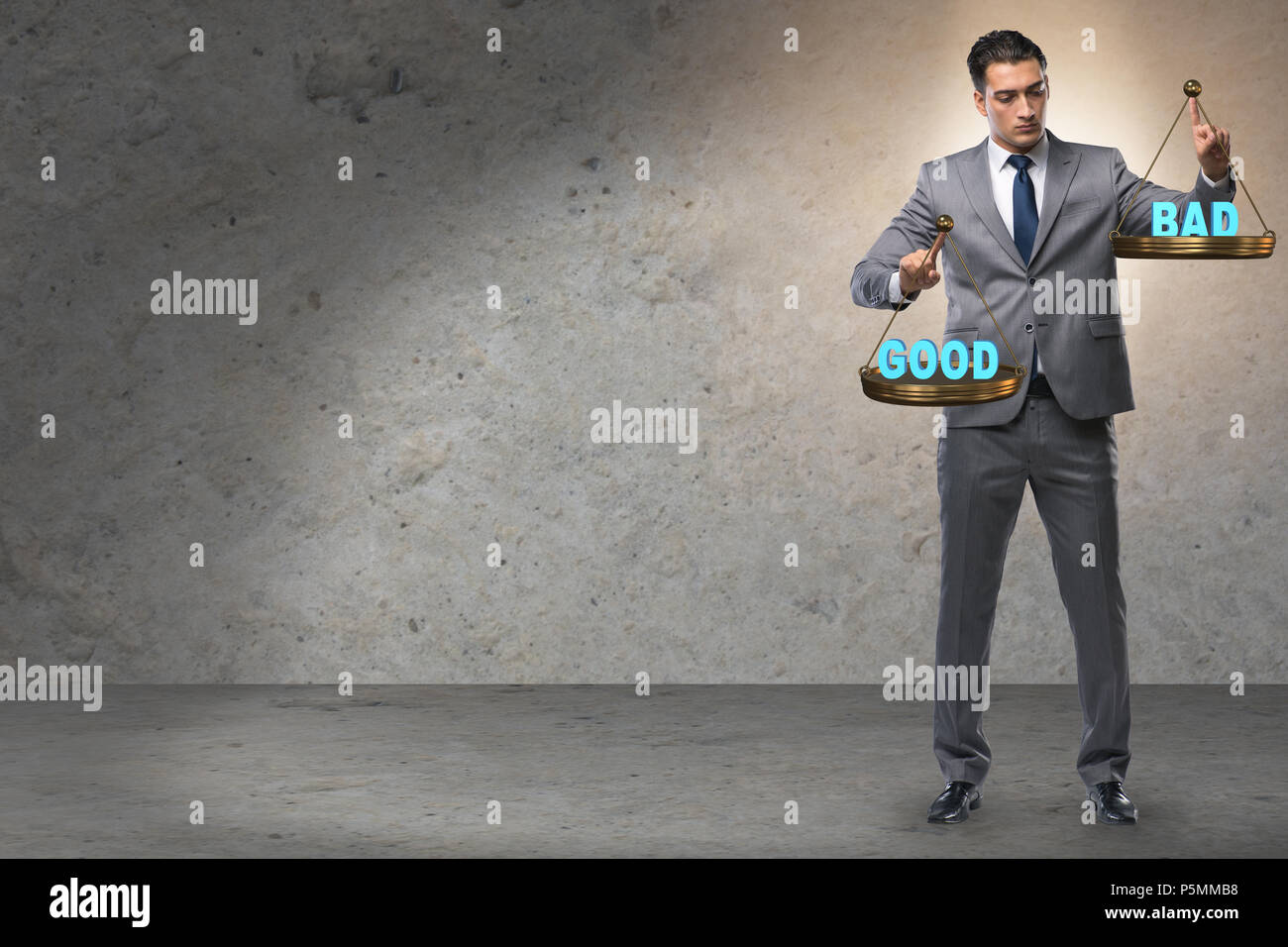 Businessman choosing between good and bad Stock Photo - Alamy