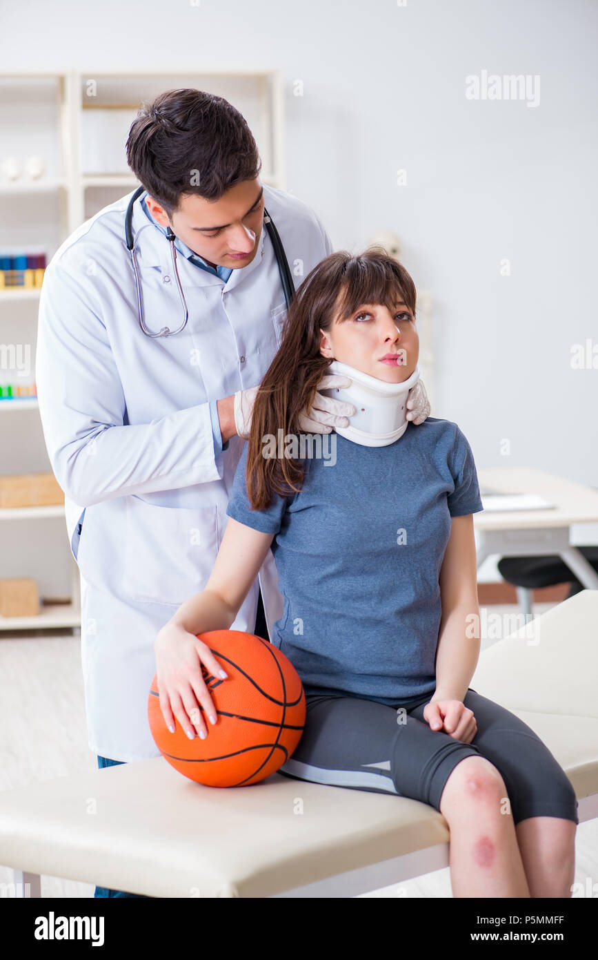 Female basketball player visiting doctor after injury Stock Photo - Alamy