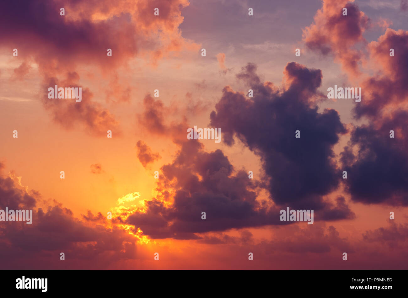 Tropical Sunset or sunrise with clouds, light rays and other ...