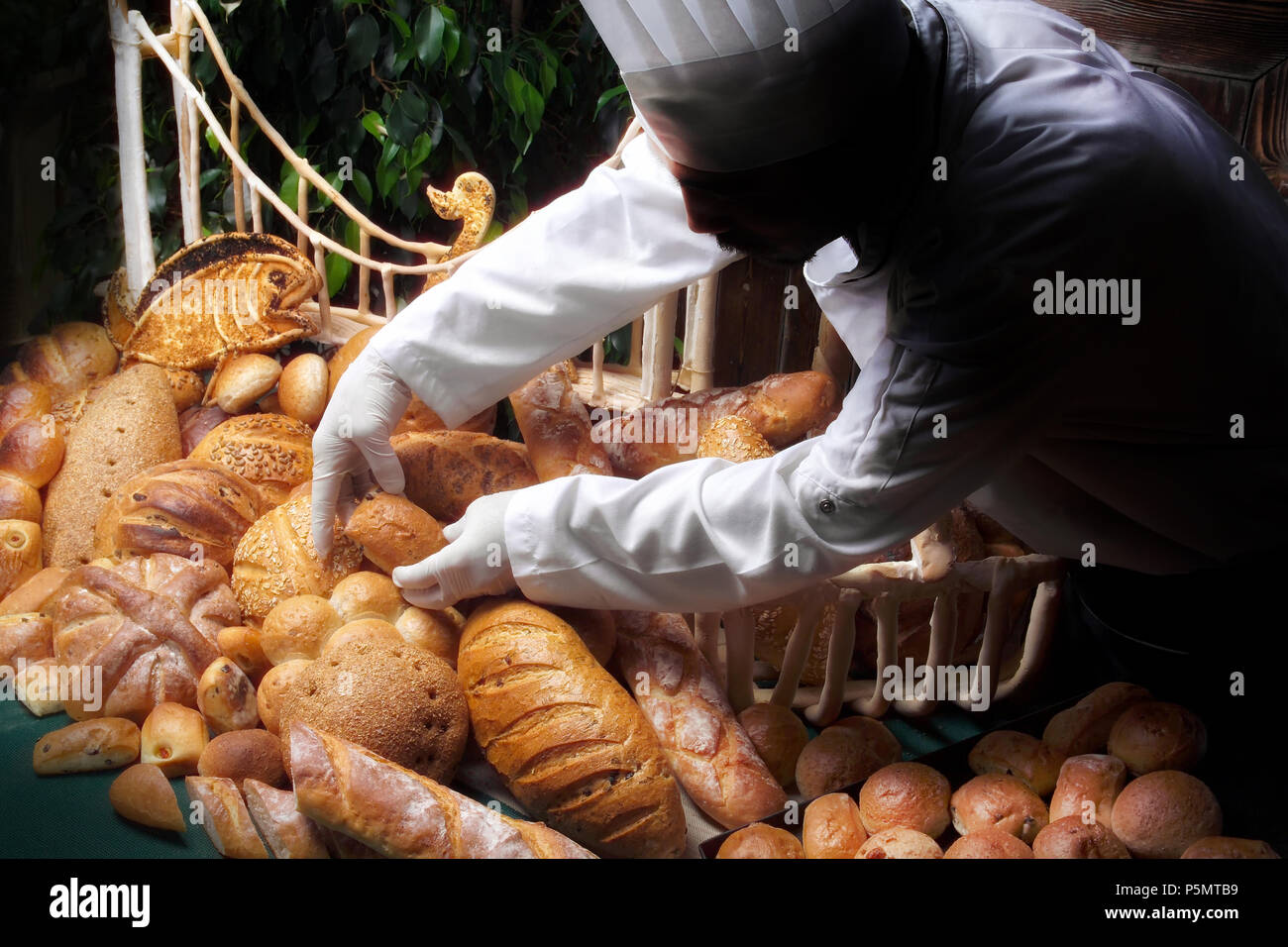 Man with display of breads hi-res stock photography and images - Alamy
