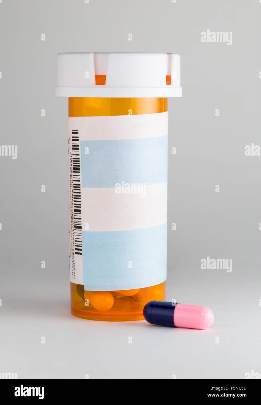 Pill bottle and pill Stock Photo - Alamy