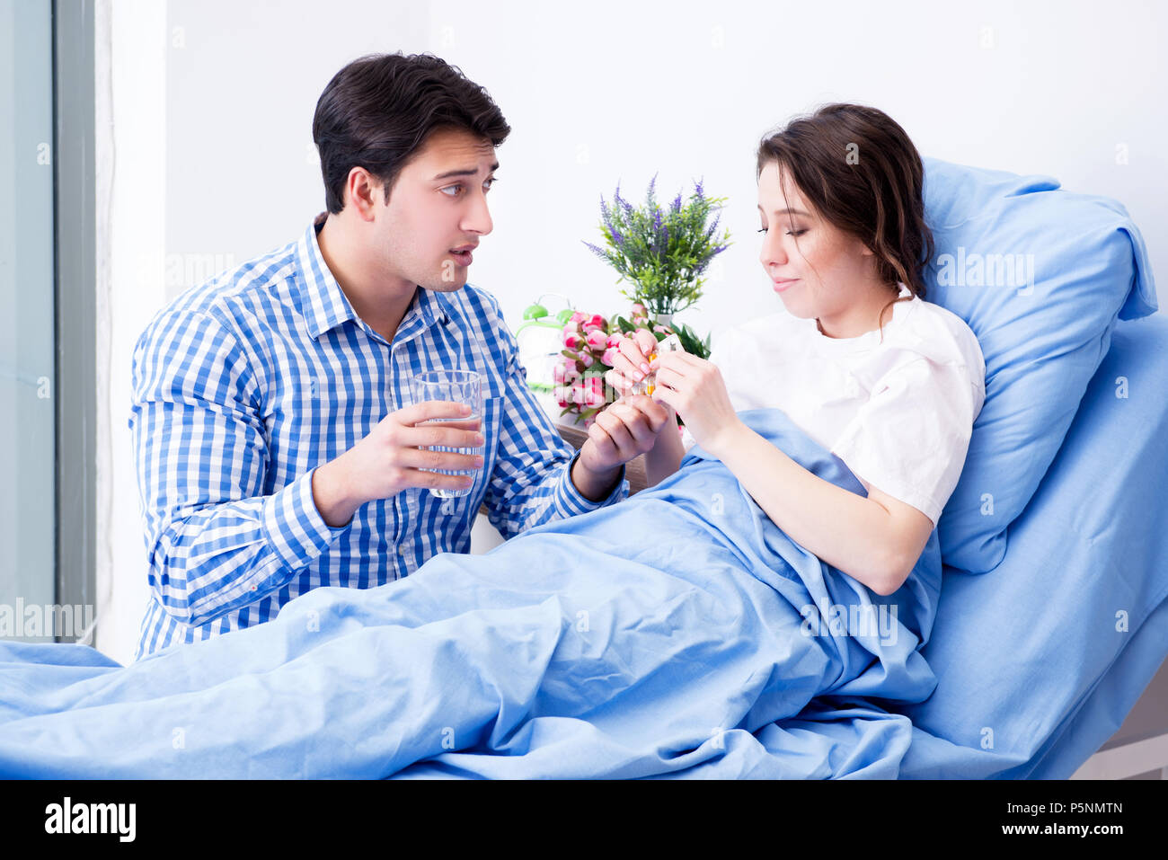 Caring loving husband visiting pregnant wife in hospital Stock Photo ...