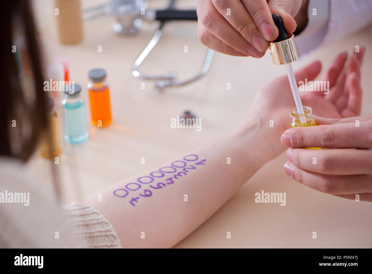 Doctor testing allergy reaction of patient in hospital Stock Photo - Alamy