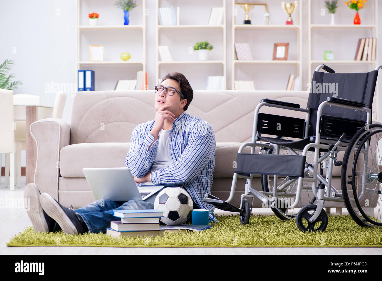Young student studying at home Stock Photo - Alamy