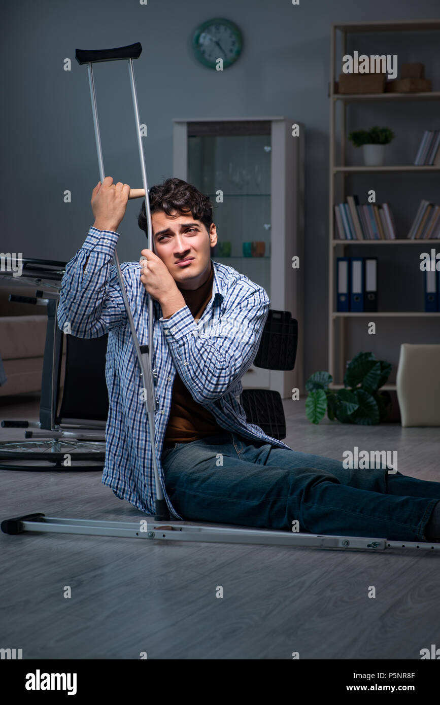 Man falling off chair hi-res stock photography and images - Alamy