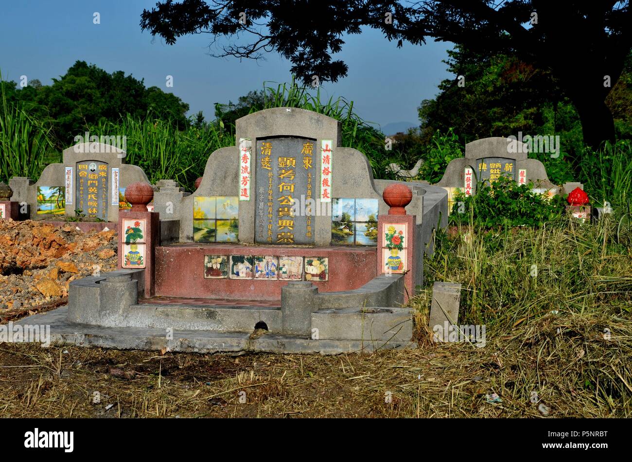 Chinese grave and ornate tombstone at cemetery graveyard Ipoh Malaysia ...