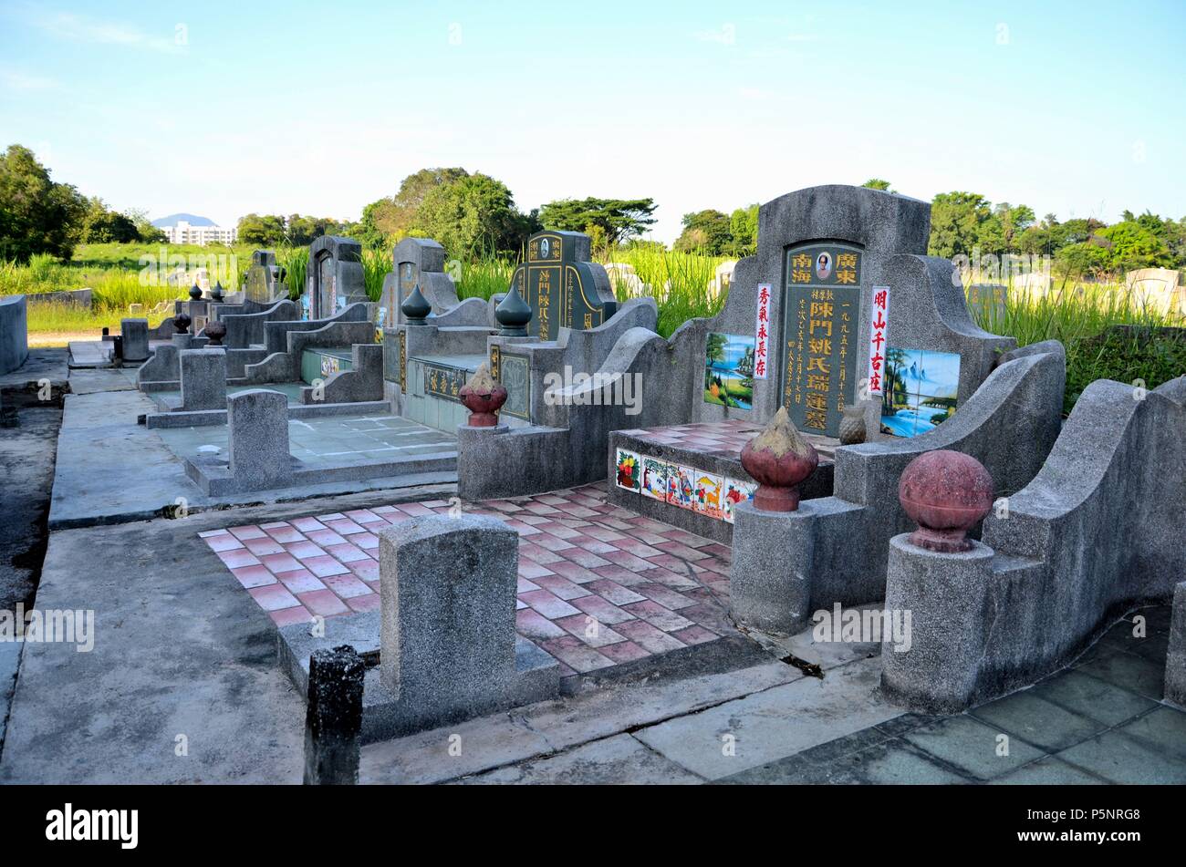 Row of Chinese grave headstones at cemetery graveyard Ipoh Malaysia ...