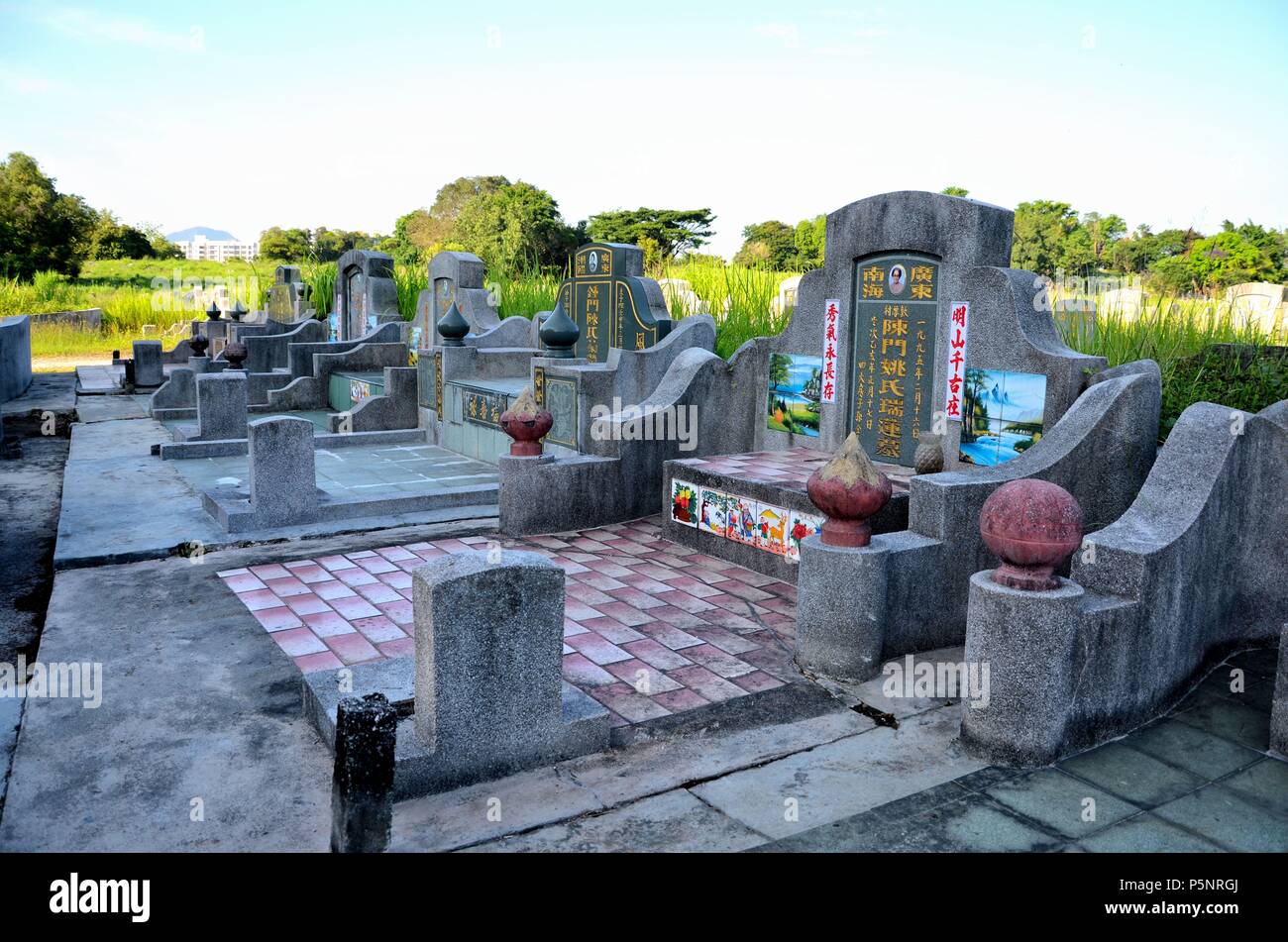 Row of Chinese grave headstones at cemetery graveyard Ipoh Malaysia ...