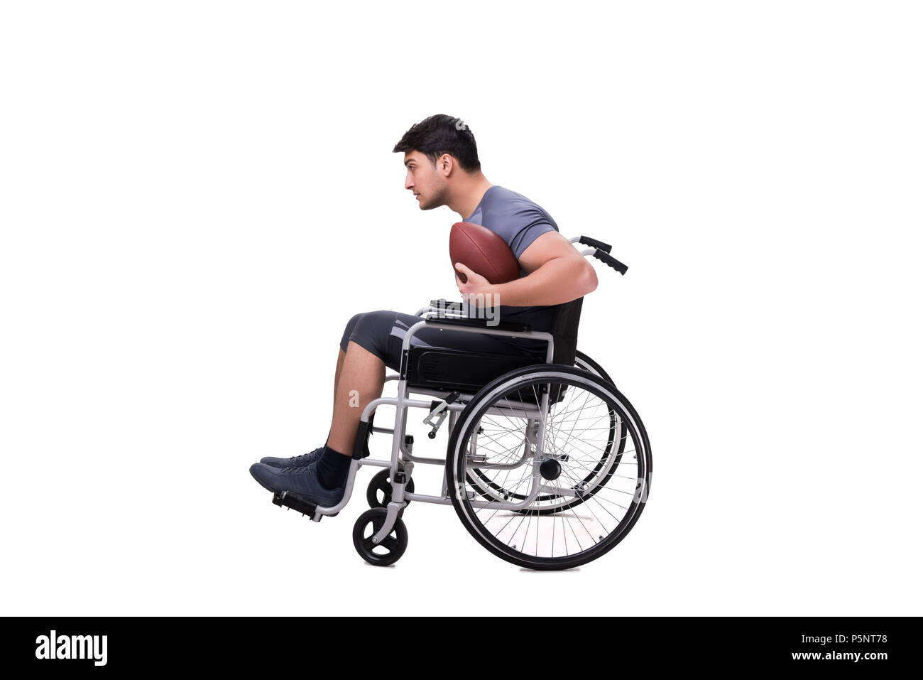 Football player recovering from injury on wheelchair Stock Photo - Alamy
