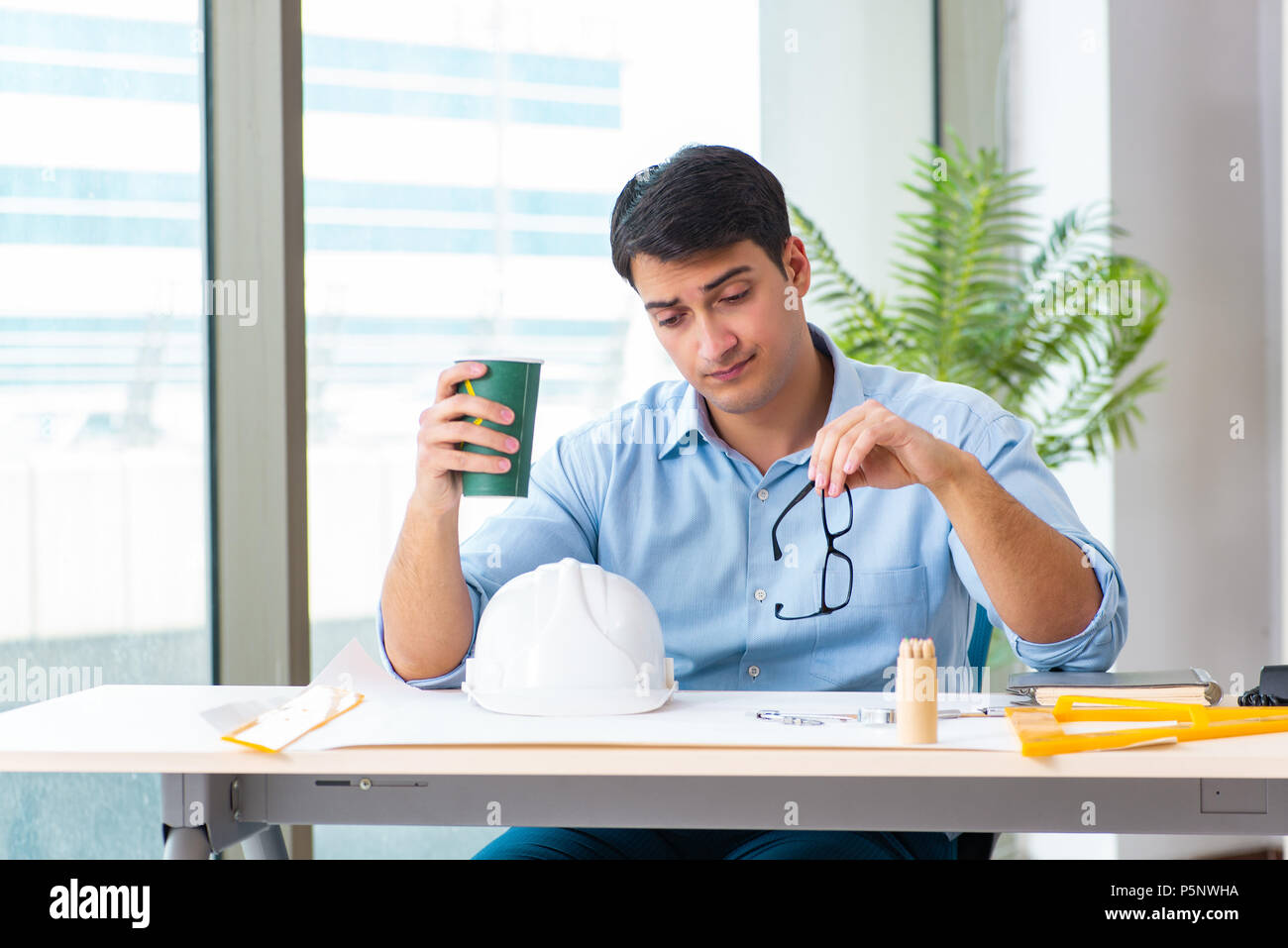 Construction engineer working on new project Stock Photo - Alamy