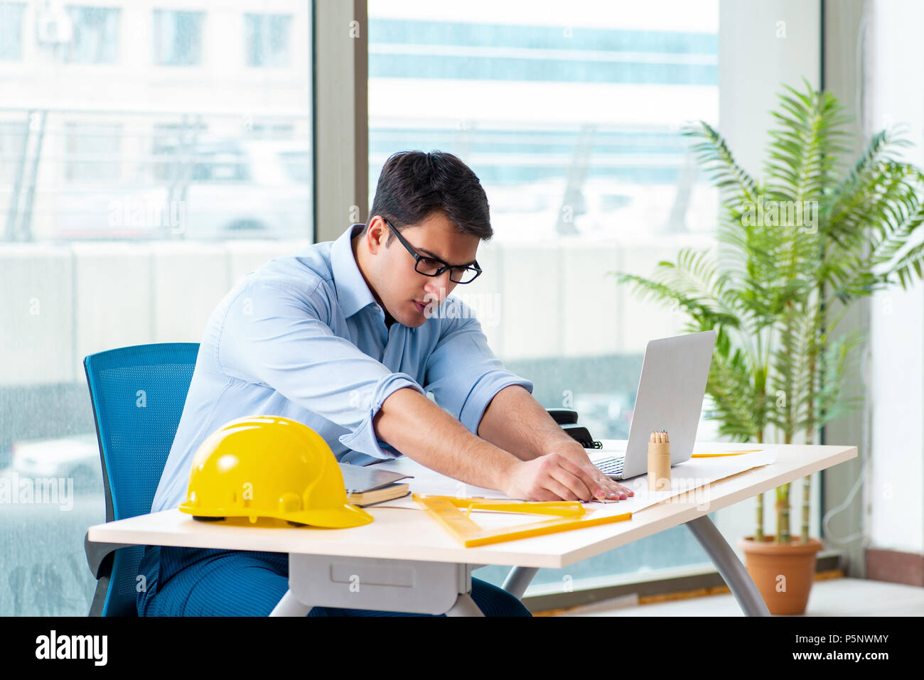 Construction engineer working on new project Stock Photo - Alamy