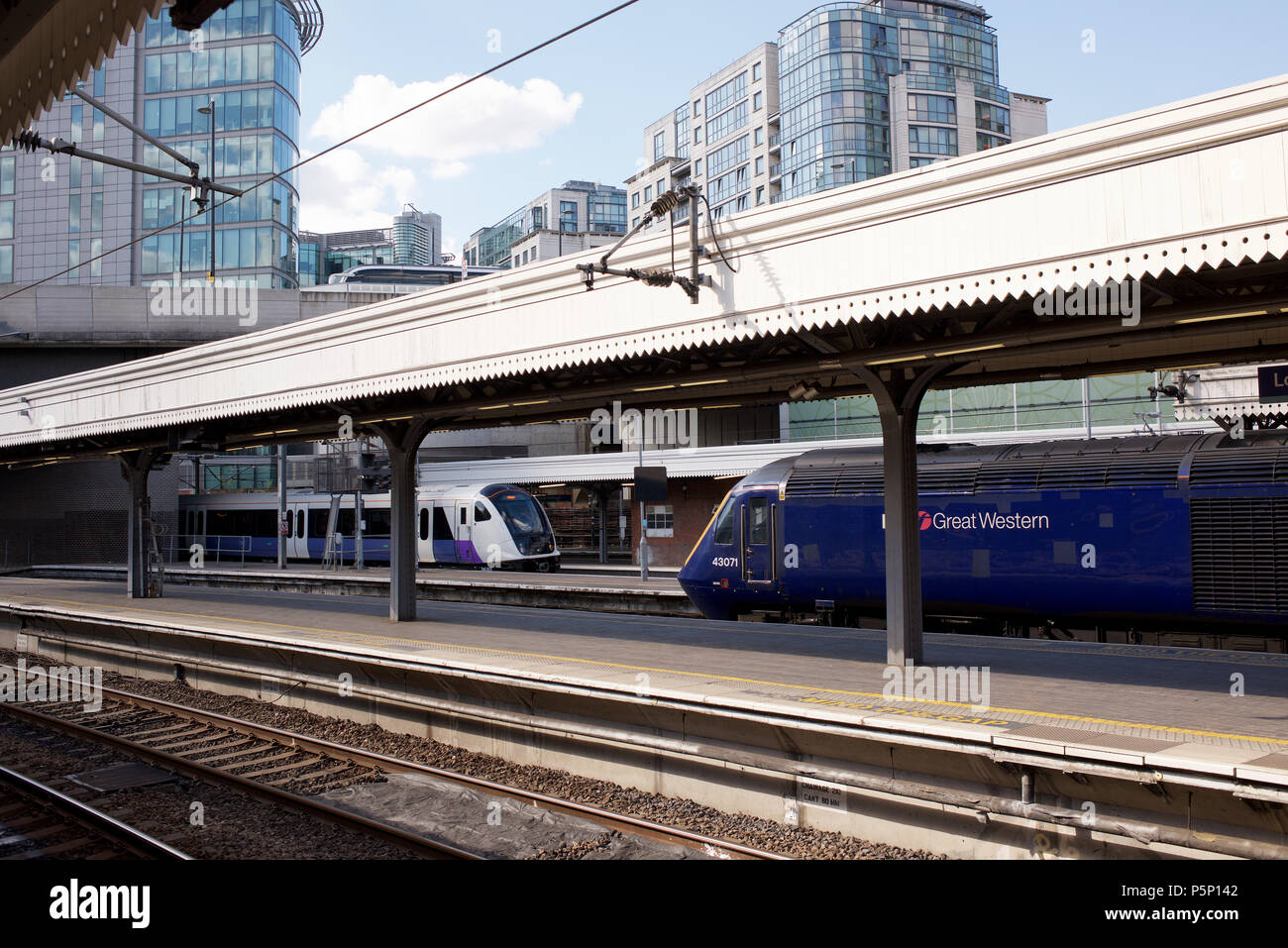 First Great Western train and a TFL train at London Paddington station ...