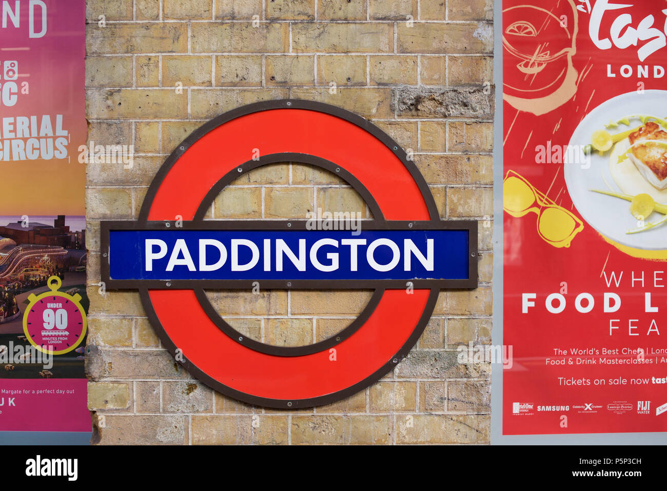 Paddington Underground sign on the platform Stock Photo - Alamy