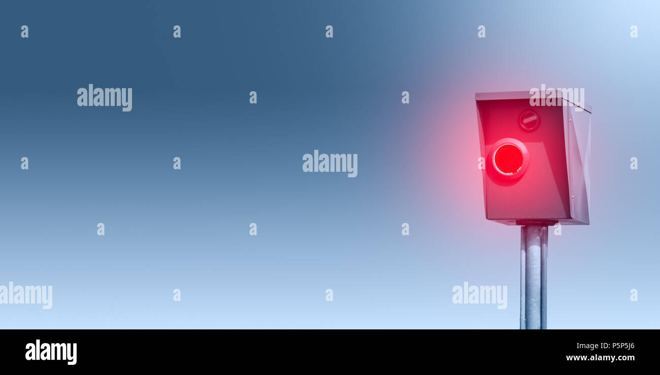 A typical radar trap, speed trap, speed camera in front of blue ...