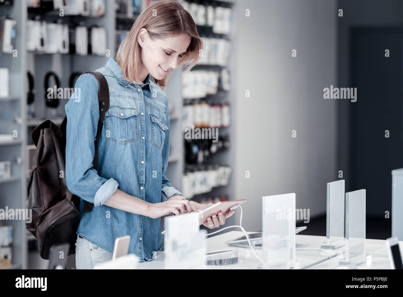 Positive popular young woman hi-res stock photography and images - Alamy
