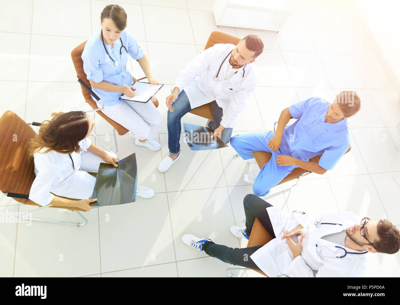 medical staff ,discussing the work plan with the patients Stock Photo ...
