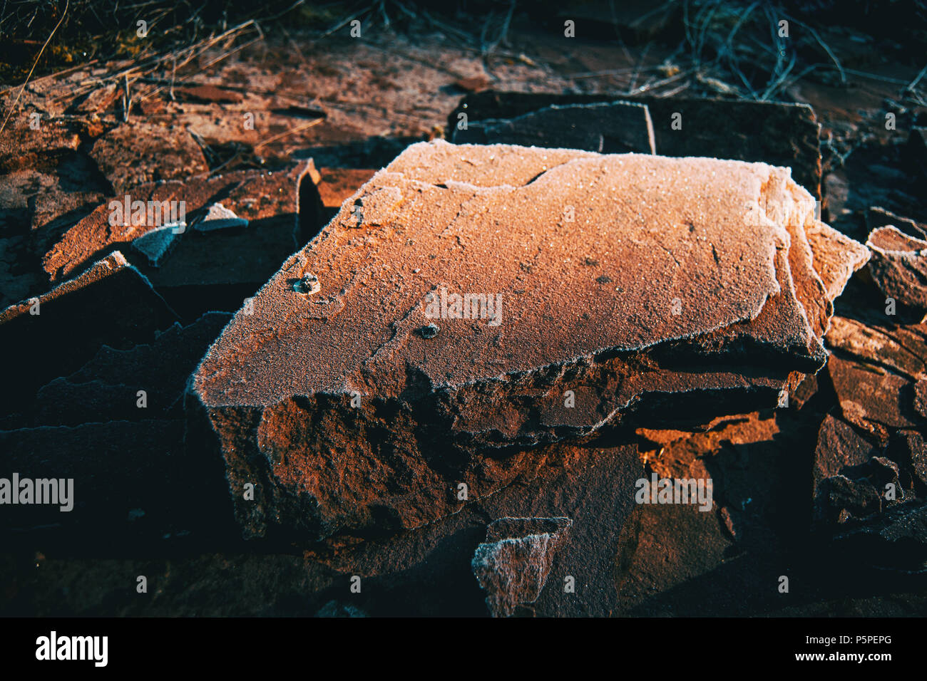 Stones placed one on top of the other frozen by the cold of winter ...