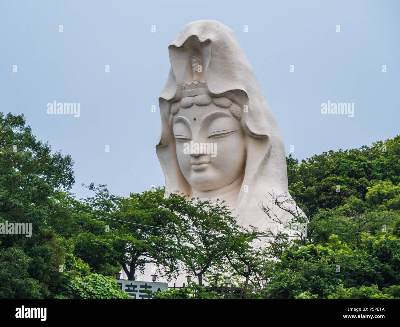 The huge sculpture of Ofuna Kannon on the hill Stock Photo - Alamy