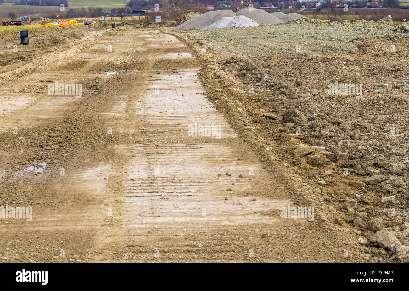 big construction site with lots of earth and loam Stock Photo - Alamy