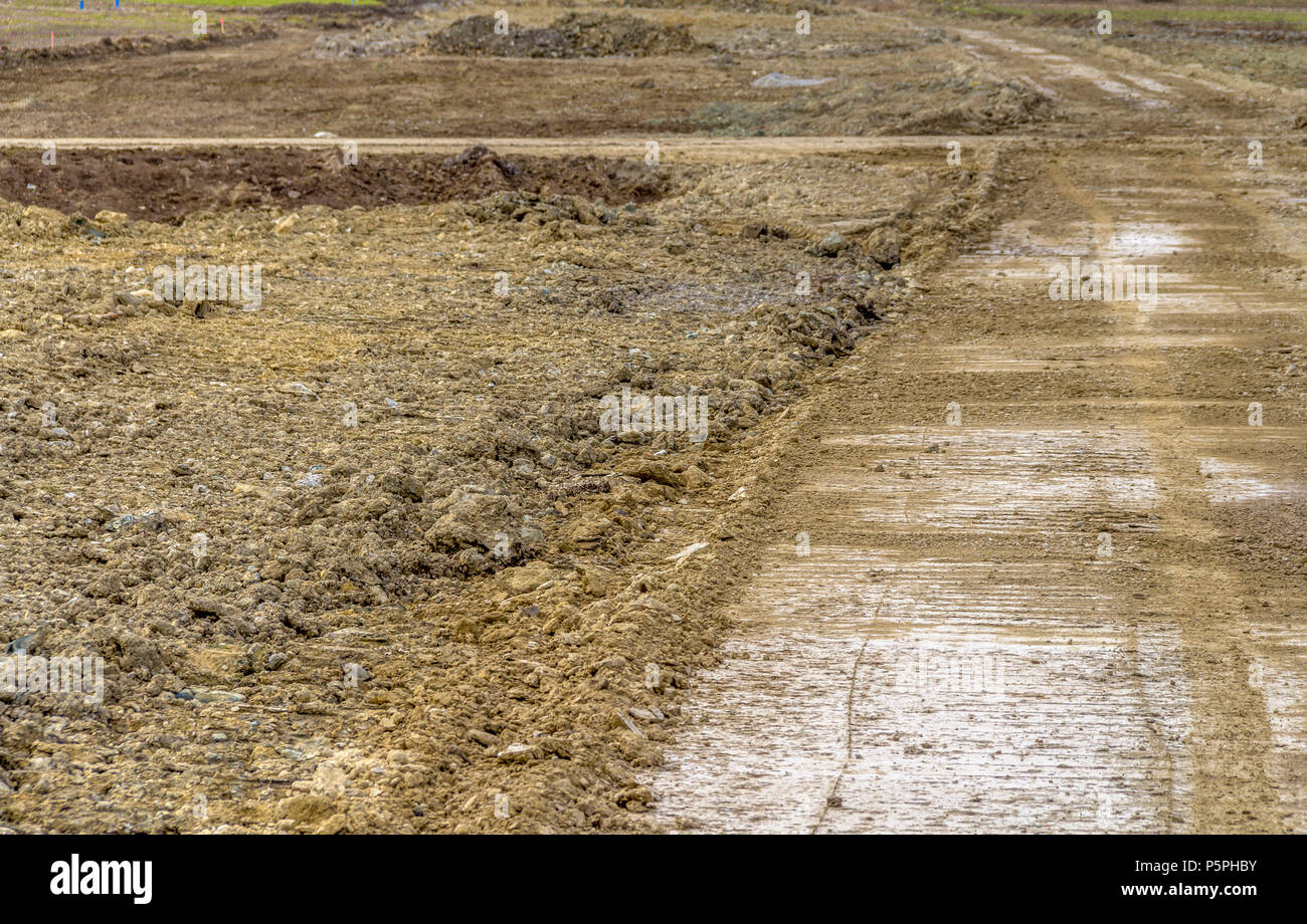 big construction site with lots of earth and loam Stock Photo - Alamy