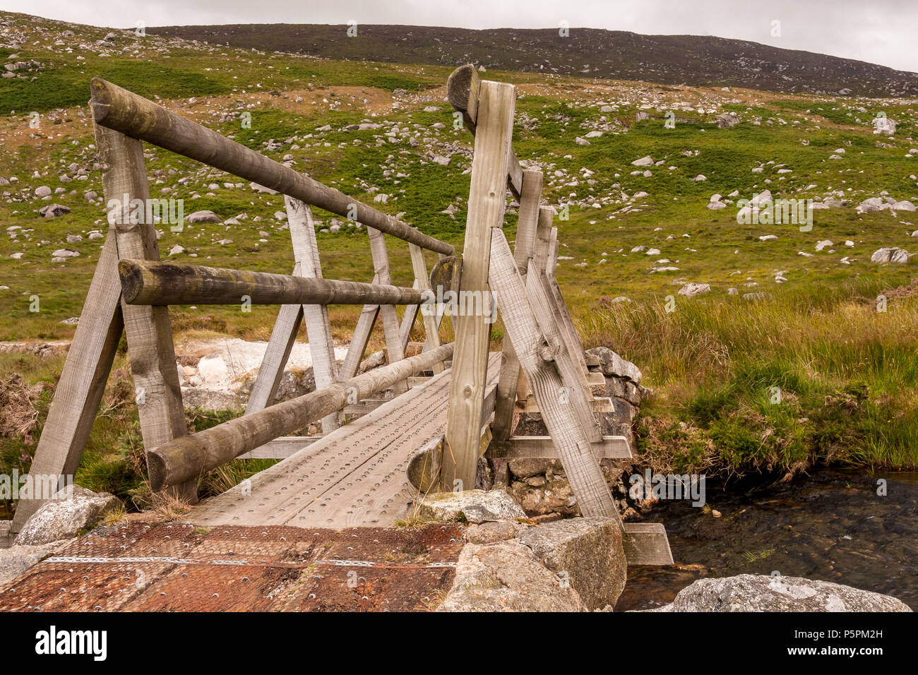 Bridge over stream in hi-res stock photography and images - Alamy